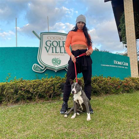 Download Taila Santos With Dog Wallpaper