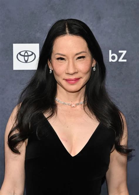 Lucy Liu Wows In A Plunging Velvet Lbd Covered In Ornate Crystal