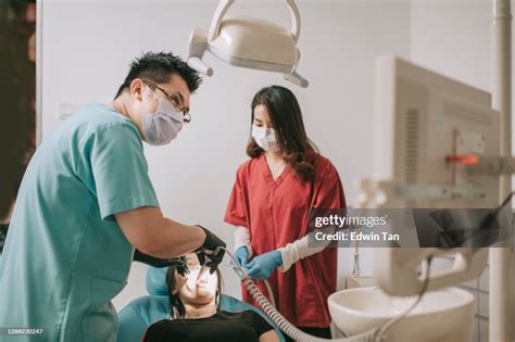 Asian Chinese Dentist Perform Surgery On His Patient With Helping From