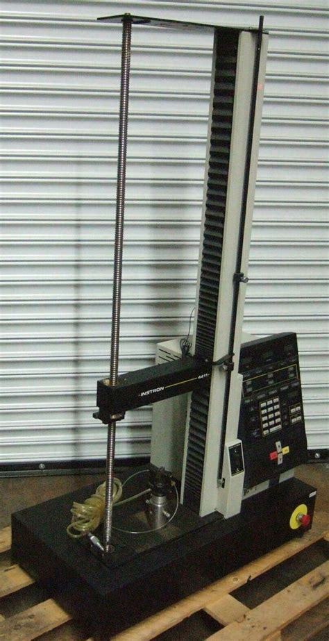 Instron 4411 Tensile Compression Pull Tester Machine 5kn Electro Mecha