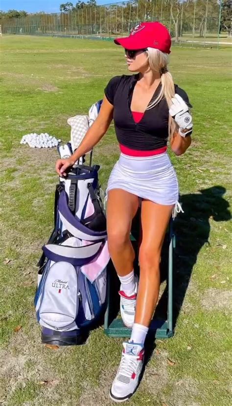 Karin Hart Shows Off Incredible Figure In Skintight White Miniskirt On