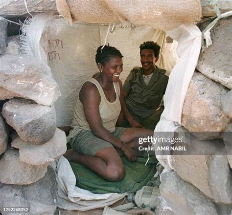 Two Eritrean Soldiers Peer From Their Shelter 17 Febuary As They Have News Photo Getty Images