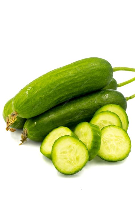Premium Photo Ripe Cucumbers On A White Background Closeup Sliced Cucumber Story Format
