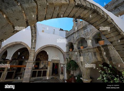 Historic Courtyard With Stone Arches And White Walls In A Mediterranean Atmosphere Agiou