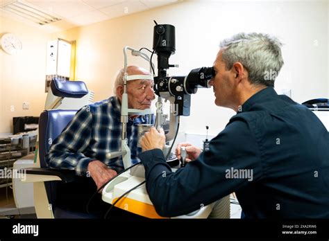 Cecil Farley Left Has His Artificial Cornea Examined As Frimley Health Performs The Countrys