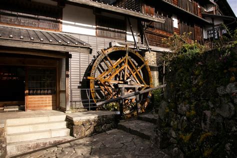 Premium Photo Water Wheel And Streets And Traditional Japanese Houses