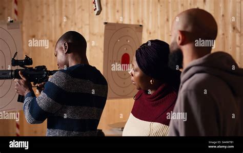 Shooting Range Safety Officer Demonstrating How To Safely Reload
