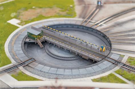 Outdoor Railway Turntable In Operation Possibly Within A Maintenance