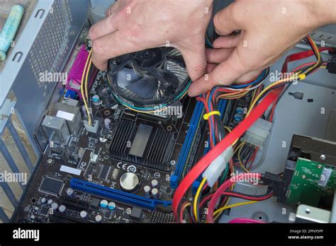 Installing Black Cooler Fan With On Computer Processor Stock Photo Alamy