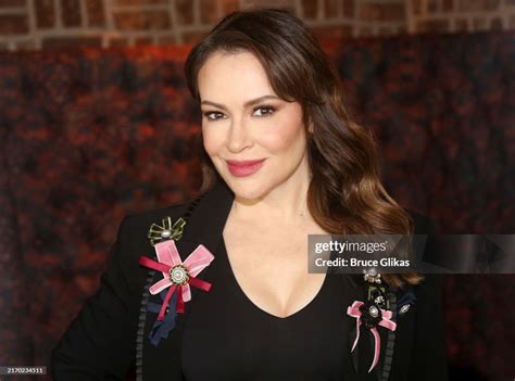 Alyssa Milano Poses At A Photo Call For Her Joining The Cast Of The