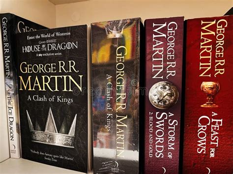 George R R Martin Book Collection On A Shelf Featuring A Clash Of