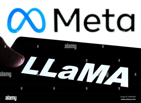 LLaMA Letters Seen On Smartphone And Blurred Meta Company Logo On Background LLaMa Is Large