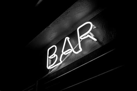 Premium Photo Neon Inscription Bar On The Wall Neon Inscription Bar