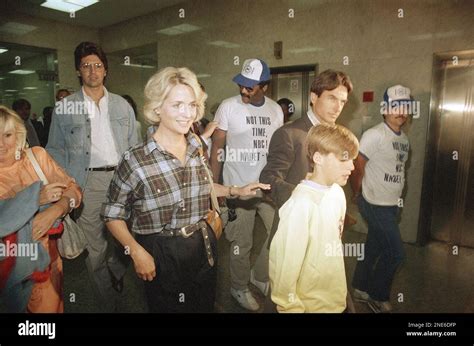 Kristin Nelson Her Son Sam And Her Brother Mark Harmon Walk Down A