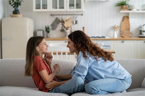 Premium Photo Positive Mother Tickling Happy Pre Teen Girl Daughter