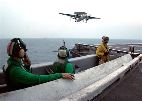 Us Navy 060203 N 0685c 001 Flight Deck Personnel Look On As An E 2c