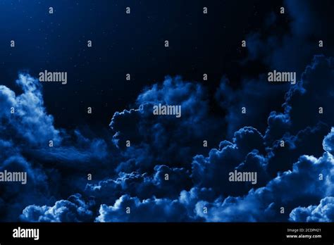 Mystical Midnight Sky With Stars Surrounded By Dramatic Clouds Dark