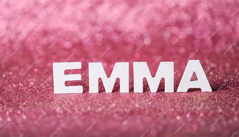 Girl Female Name Emma White Letters Blurred Pink Glittering Backdrop