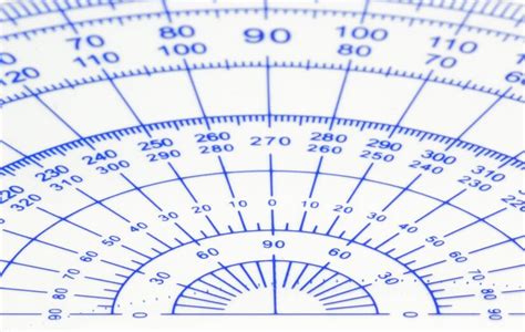 Premium Photo Close Up Of Protractor Over White Background