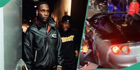 “raise Am” Burna Boy Flaunts New N638 Million Ferrari Revs Engine In