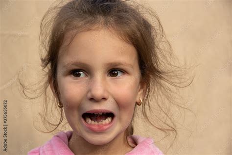 A Five Year Old Girl Does A Special Tongue Fungus Exercise To Improve