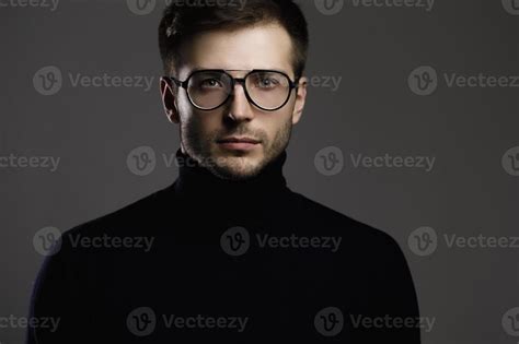 Young Smart Man Wearing Glasses And A Folded Polo Neck 16237070 Stock