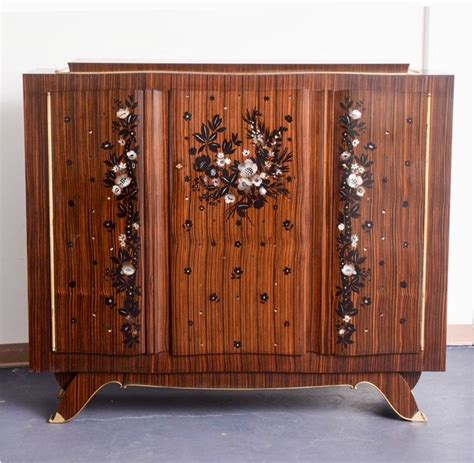 French Art Deco Cabinet With Intricate Carvings Antique And Vintage