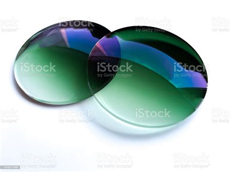 Two Green Gradient Sun Protection Plastic Eyeglass Lens On White