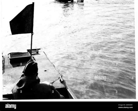 A British Army Time Keeper Signals The End Of A Six Minute Wading Trial