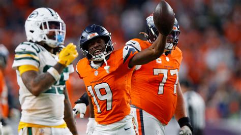 Nfl Highlights Broncos Upset Packers Clinch A Playoff Spot