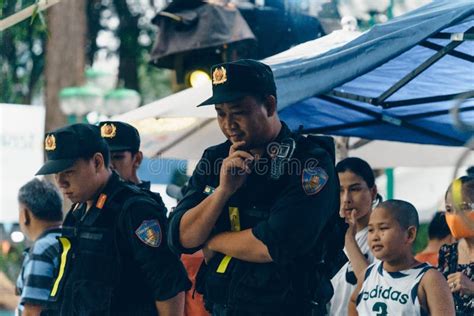 Vietnamese Police Officers Are Protecting Order At Outdoor Festival In
