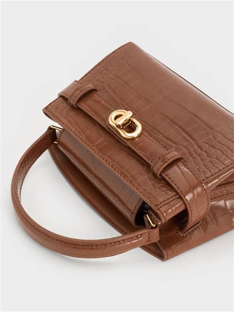 Tas Top Handle Croc Effect Aubrielle Chocolate Croco Charles And Keith Id