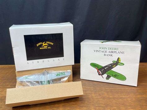 2 John Deere Airplane Nib Sc Aumann Auctions Inc