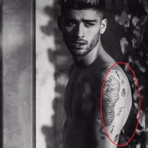 Zayn Malik Gun Tattoo Meaning Zyan Maliks 46 Tattoos And Their Meanings