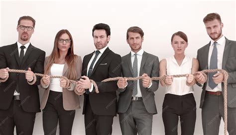 Premium Photo Group Of Young People Tied With A Strong Rope