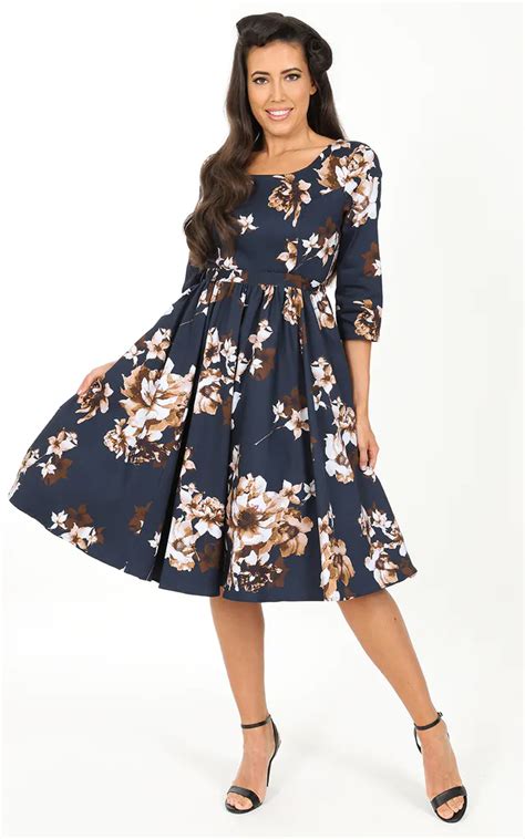 Laura Floral Swing Dress In Navy Blue With Deep Rounded Neckline