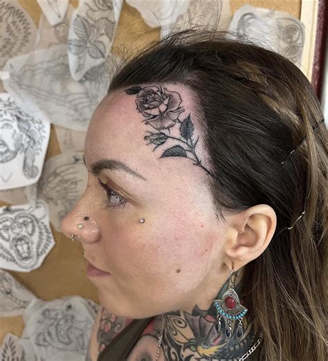 Woman Face Tattoo With Flowers