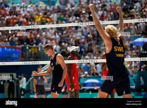 Swedens Jonatan Hellvig Left Celebrates In A Beach Volleyball Match