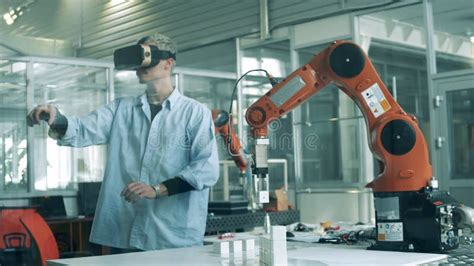 Robotic Device Is Being Managed By A Male Researcher In Vr Glasses