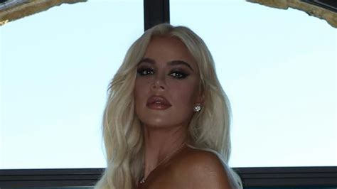Khloe Kardashian Flashes Her Bare Butt In Completely Sheer White Dandg Dress In New Photos That