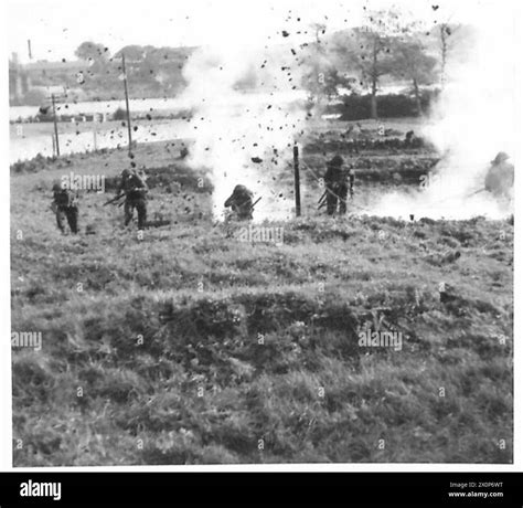 Realisitic Training Troops Getting Through A Barbed Wire Obstacle