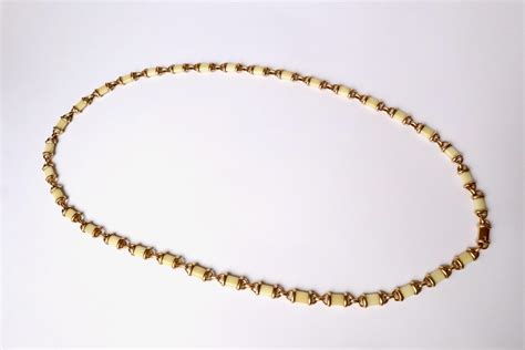 Van Cleef And Arpels Ivory Long Necklace 18 Carat Gold 1950 For Sale At 1stdibs