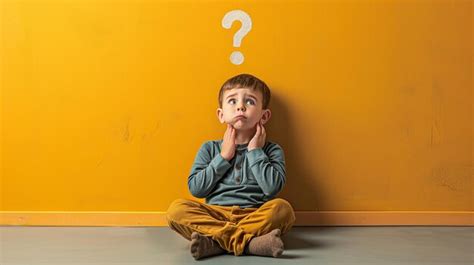 Boy Sitting On Floor Looking Up At A Question Mark Premium Ai