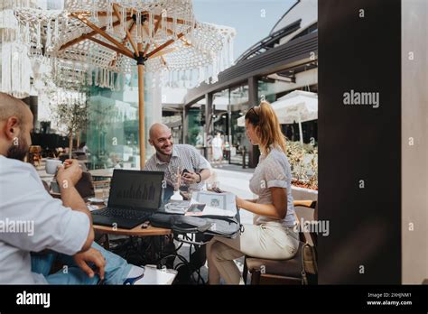 Startup Team In Business Meeting Discussing Brainstorming And