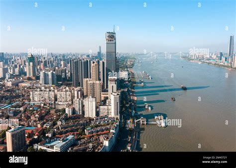 An Aerial View Of Shanghai Cityscape And The Huangpu River On Blue Sky
