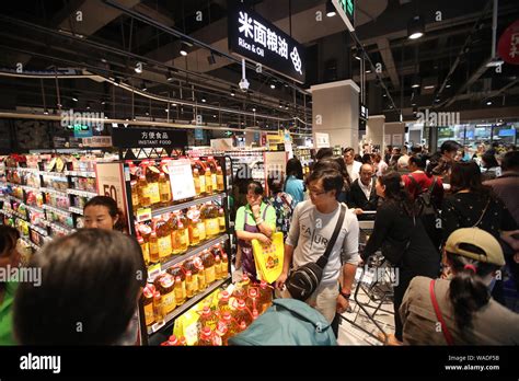 Consumers Shop At The First Hema Supermarket A Chinese Fresh Items