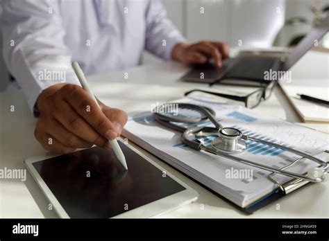 Healthcare And Medical Doctor Analyzing Medical Report Medical