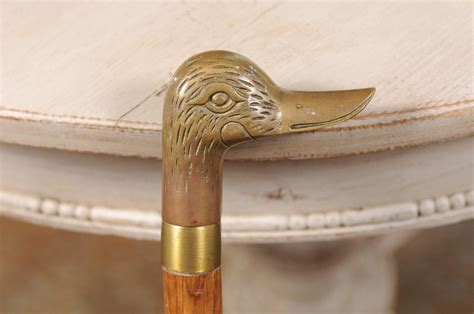English Wooden Walking Cane With Brass Duck Head Handle And Ebonized