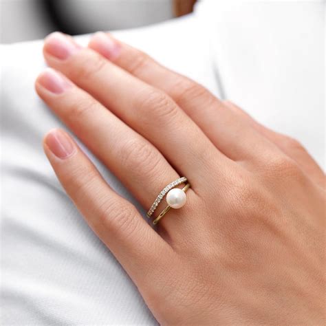Simple Pearl Engagement Rings