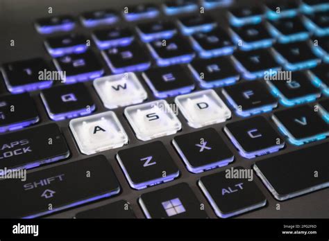 Highlighted Gaming Keys With Blue Purple Gradient Light And Blurred Background Powerful Dark